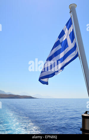 Crete, Greece: Greek flag over Gramvousa island and Balos Lagoon Stock ...
