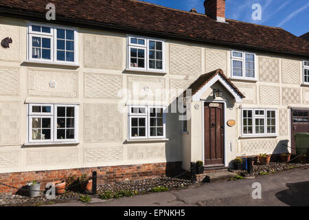 A village house with a chequerboard pattern of pargetting designs ...