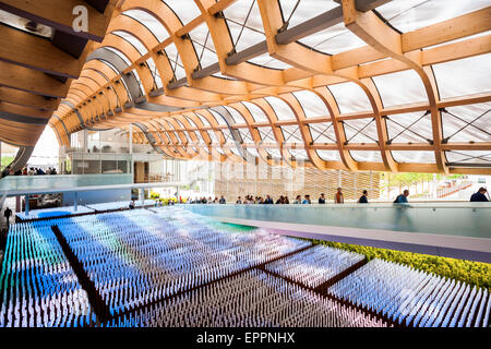 LED lighting installation underneath undulating roofline. Milan Expo ...