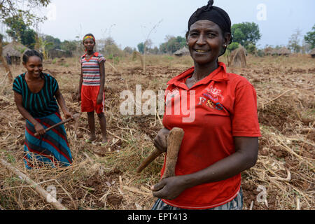 ETHIOPIA Gambela, small scale farmer in village near the large farm of ...