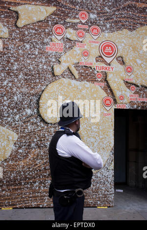 Police officer on the map of the world. Macro photo Stock Photo - Alamy