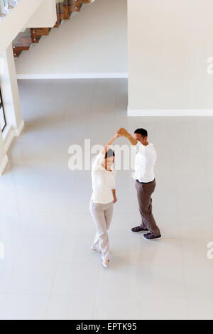 Overhead view of cheerful couple Stock Photo - Alamy