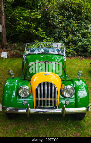 British racing green Morgan Plus Four car parked on display at a Super ...