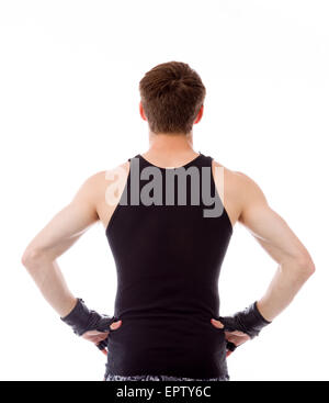 Man holding sword behind his back Stock Photo - Alamy