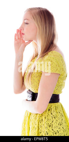 Young woman over yellow background points finger at you Stock Photo - Alamy