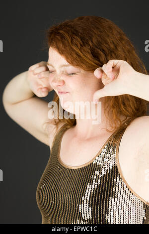 Frustrated and angry woman in dress, scream and frown at camera ...