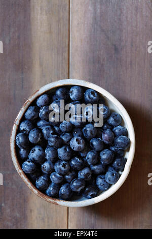 Blueberries in stacked bowls. These are the fruit of the blueberry ...