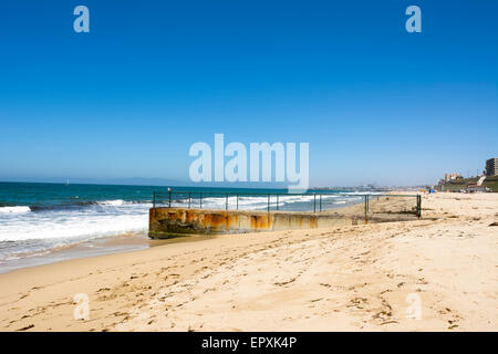 A sand groin used in oceanography to block sand from eroding the ...