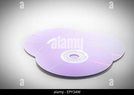 three dvds isolated on a white background Stock Photo - Alamy