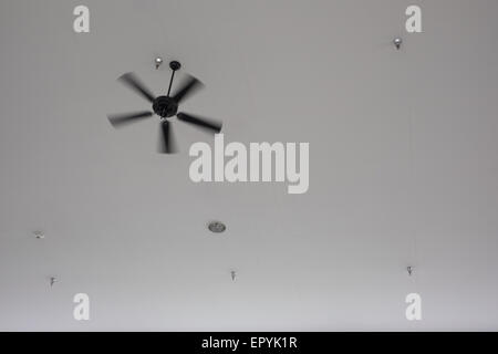 White ceiling ventilator spinning Stock Photo - Alamy