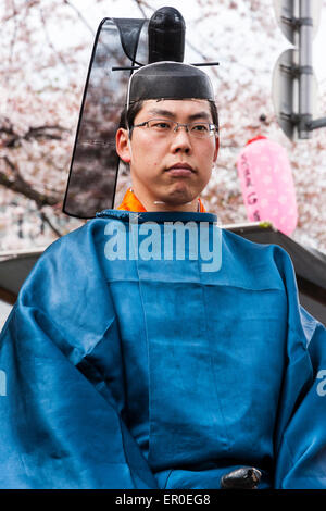 A man dressed in Heian period costume at the Gokusui no en festival in ...