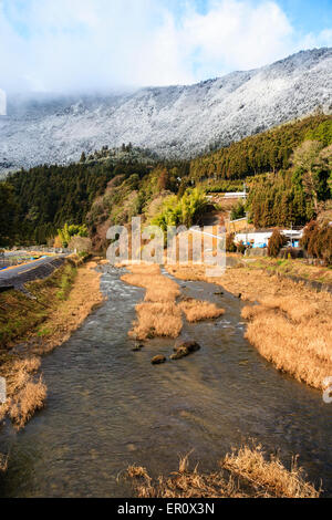 Wintertime at Soni in Japan. River running along road and through ...