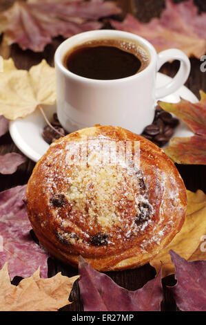 Cup of coffee with beans and leaves on light background Stock Photo - Alamy
