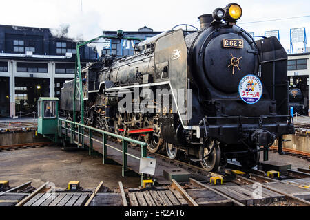 A 1954 C622 class Japanese railway locomotive on turntable while ...