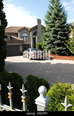 Luxury mansion with luxury car in driveway Stock Photo - Alamy