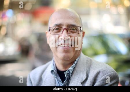 Mainz, Germany. 21st May, 2015. Social pedagogue Behrouz Asadi poses in ...