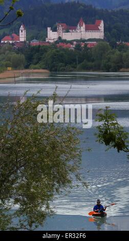 Fuessen, Germany. 25th May, 2015. A sporting airplane flies past dark ...