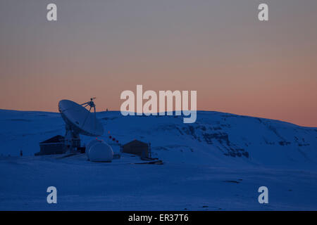 A giant VLBI antenna from the Norwegian Mapping Authority (NMA) turns ...