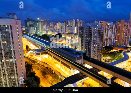 Long Ping, hong kong urban downtown and high speed train at night Stock ...