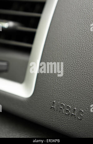 Safety airbag sign on dashboard in car, closeup Stock Photo - Alamy