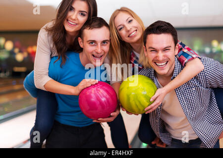 Friends Bowling Together Stock Photo - Alamy