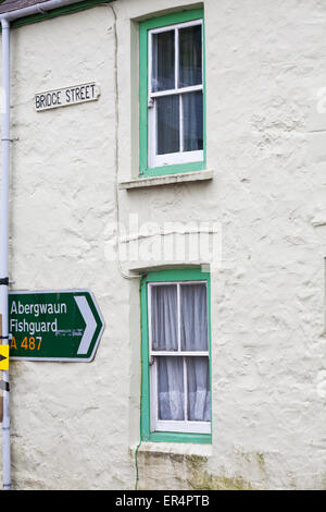 A487 traffic sign by cottage on Bridge Street at Lower Fishguard or ...