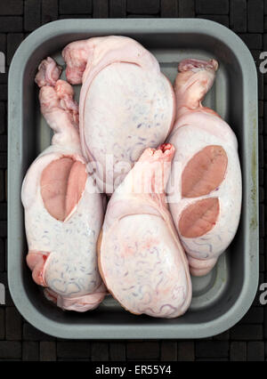 Raw bulls testicles on roasting tray Stock Photo - Alamy