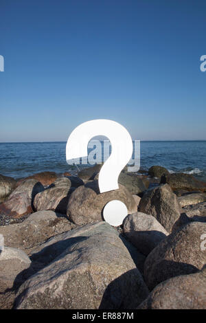 Sea rocks against the blue clear sky Stock Photo - Alamy