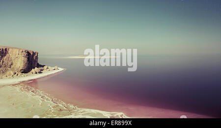 A scenic view of Lake Urmia in Iran under a cloudless blue sky on a ...