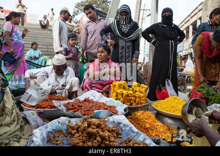 Sweet and food stall in Bijapur Market Stock Photo - Alamy
