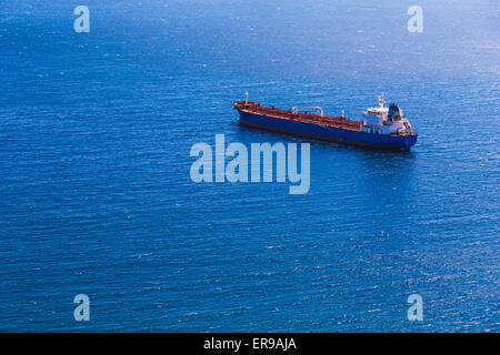Empty container cargo ship in the blue sea. Aerial view Stock Photo - Alamy
