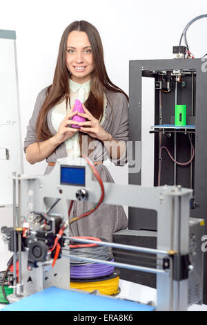 Beautiful girl with three-dimensional printer Stock Photo - Alamy