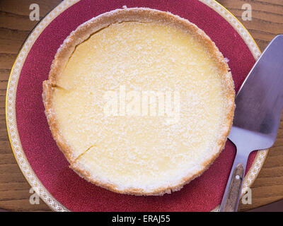 Delicious freshly baked egg tart tray with golden crust and sweet ...