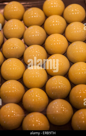 Close cut of shinny chocolate candy Stock Photo - Alamy