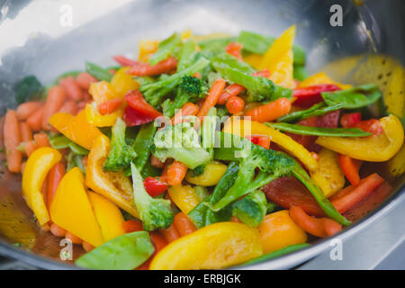 Stir fry vegetables as a background. Shallow dof Stock Photo - Alamy