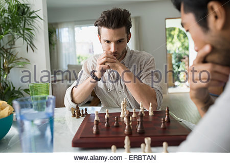 Group of men playing chess on a large chess board at Trg Oslobodjenja ...