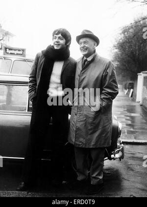 Paul McCartney of the Beatles in his mini car arrives at the Apple ...
