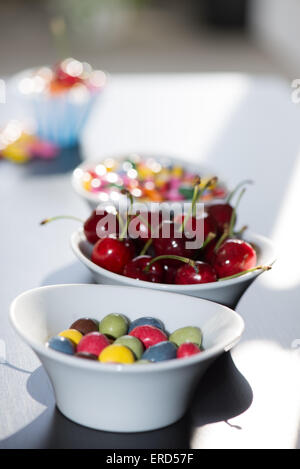 fruit vs candy, health Stock Photo - Alamy