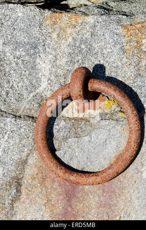 Rusty texture on the old mooring bollard, heavy corrosion of steel ...