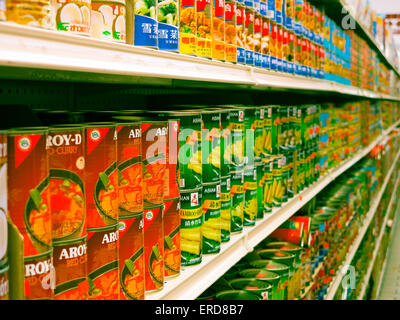 Asian store with cans Stock Photo - Alamy