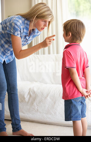Mother Telling Off Son At Home Stock Photo: 73143329 - Alamy