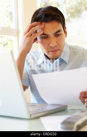 Filipino man working at home Stock Photo - Alamy