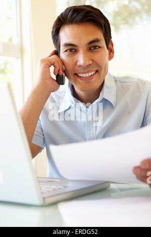 Filipino man working at home Stock Photo - Alamy