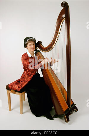 Welsh triple harp being played by Eluned Pierce wearing traditional ...