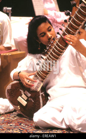 Young musician playing the sitar Stock Photo - Alamy