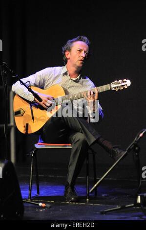 Dave Kelbie playing guitar as part of the Evan Christopher Quartet at ...