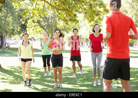 Instructor Running Fitness Boot Camp Stock Photo - Alamy