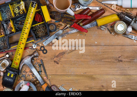 Home maintenance - An untidy workbench full of dusty old tools and ...