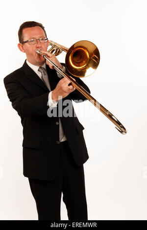 Tenor Trombone player in playing position Stock Photo - Alamy