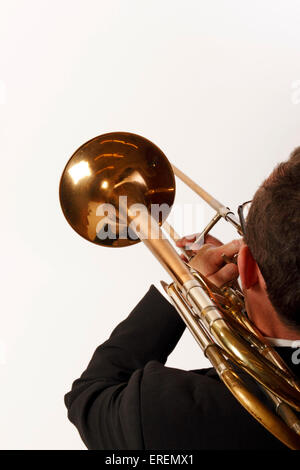 Tenor Trombone player in playing position Stock Photo - Alamy